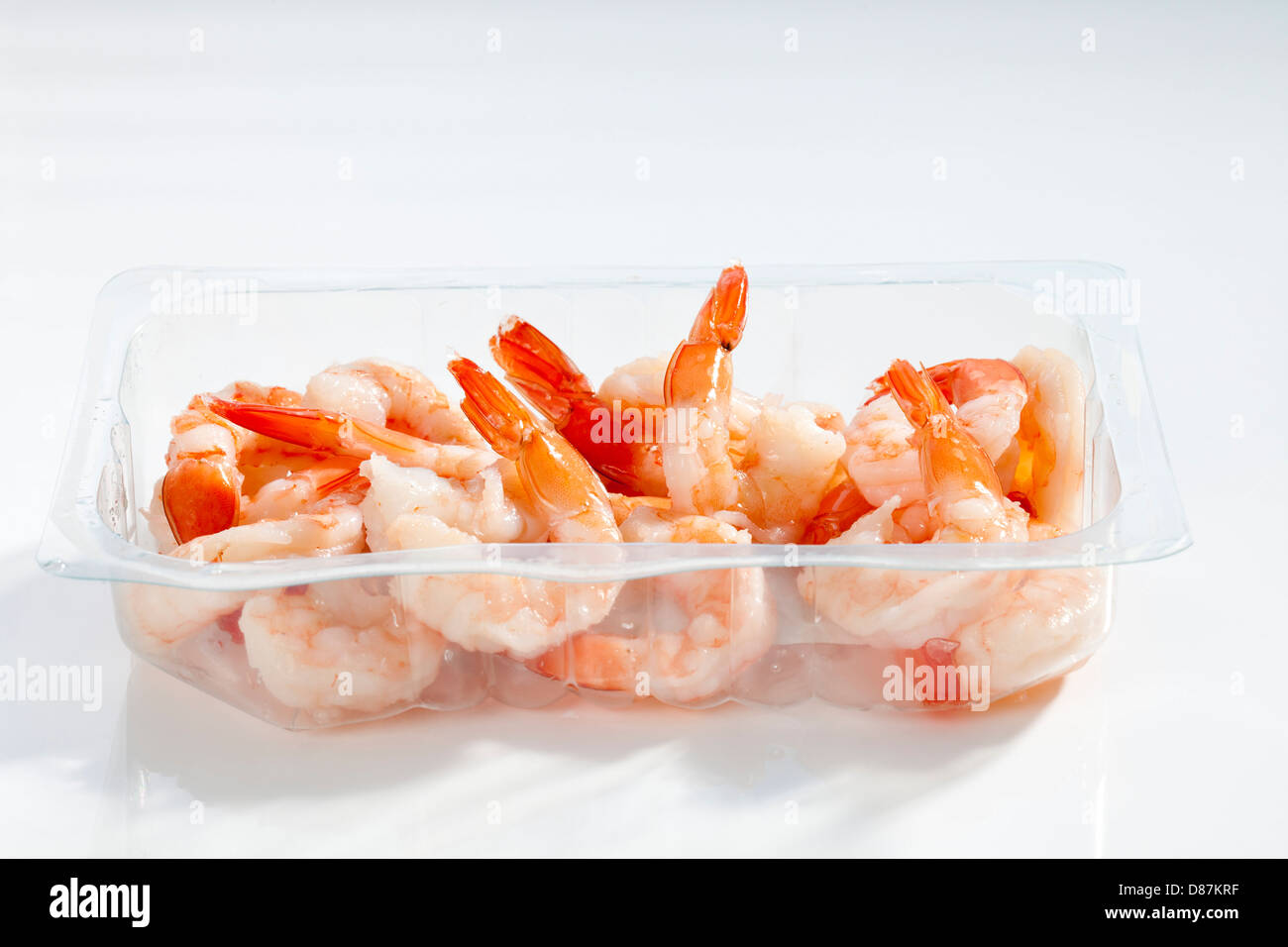 Prawns in plastic container, close up Stock Photo - Alamy