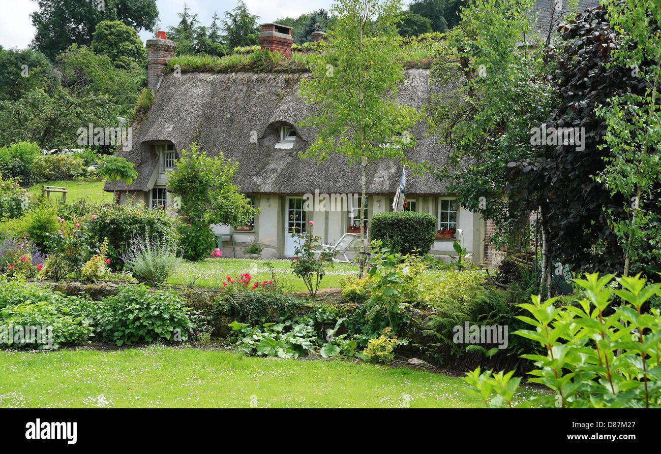 Traditional Timber Framed Norman rural Cottage and garden Stock Photo ...