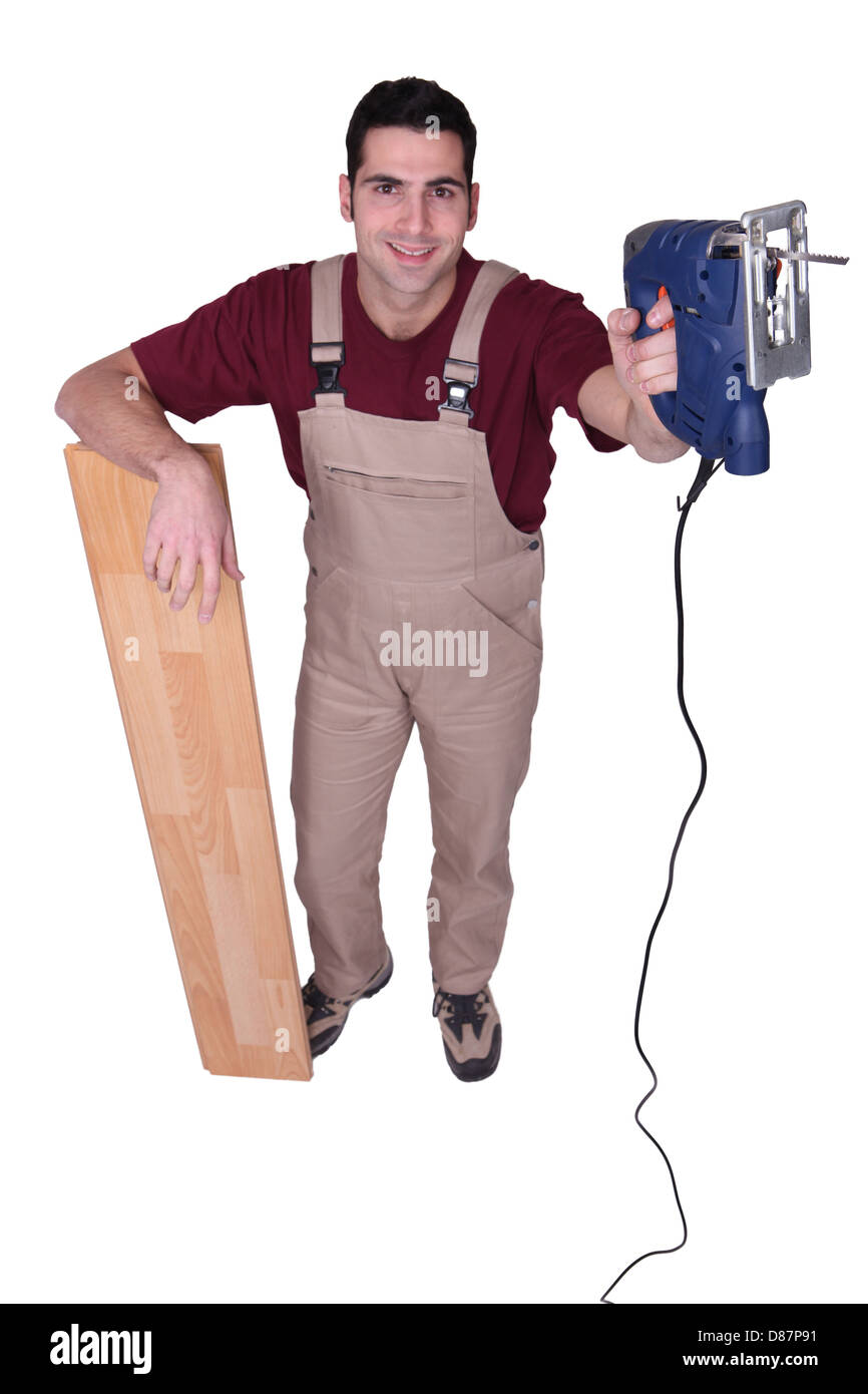 Man using a jigsaw Stock Photo - Alamy
