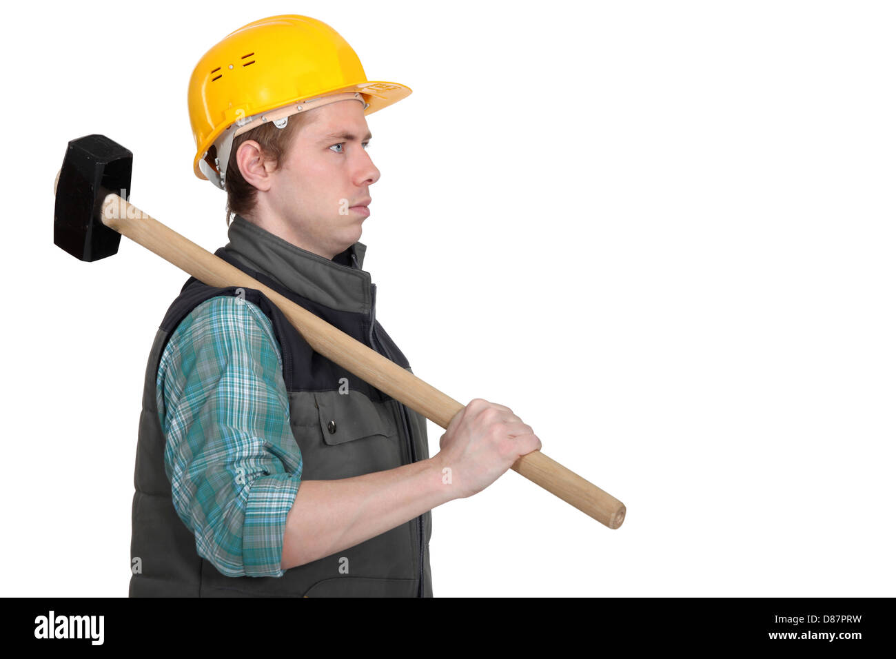 A construction worker with a sledgehammer Stock Photo - Alamy