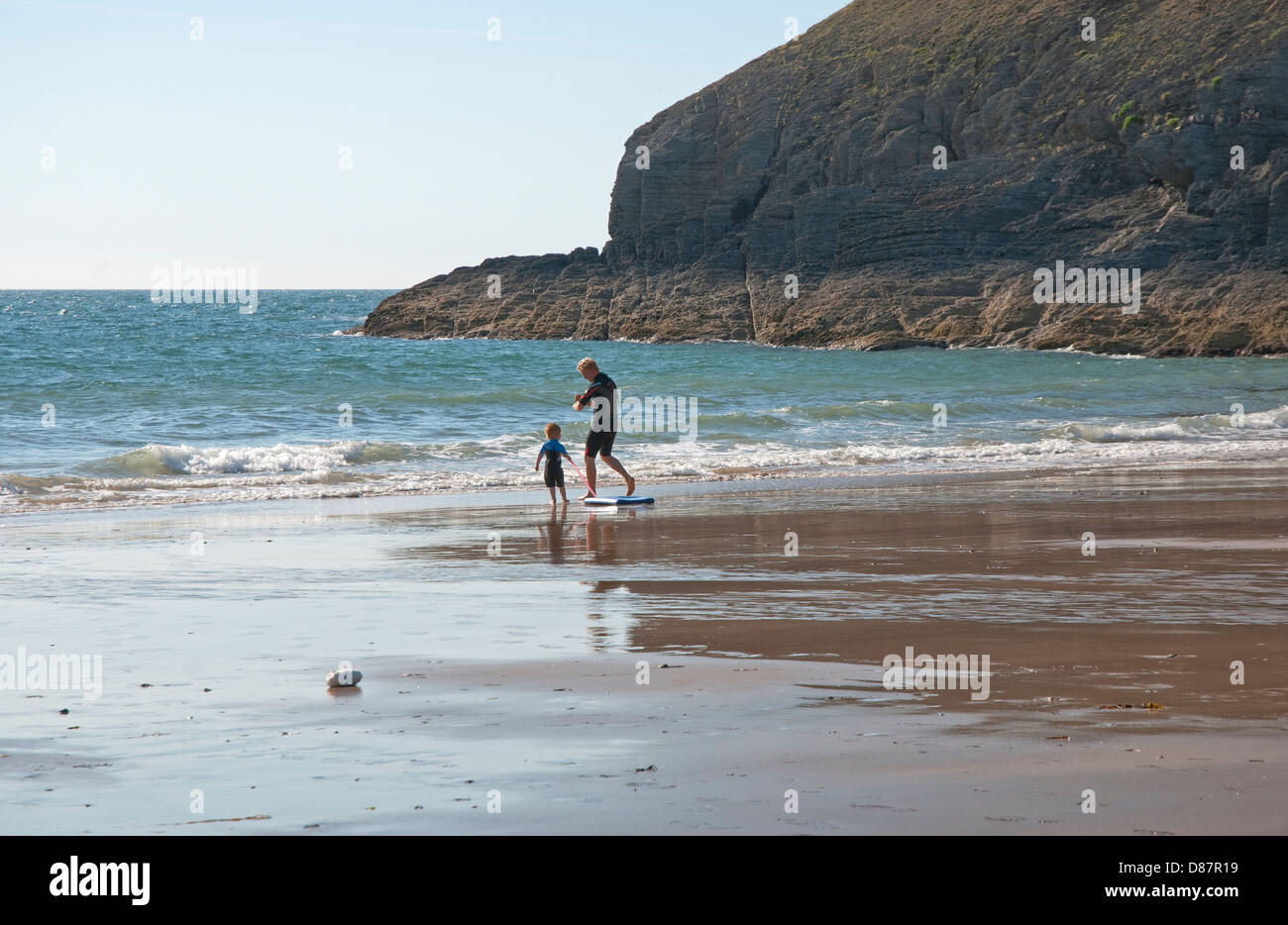 Father teaching son swimming suit hi-res stock photography and images ...
