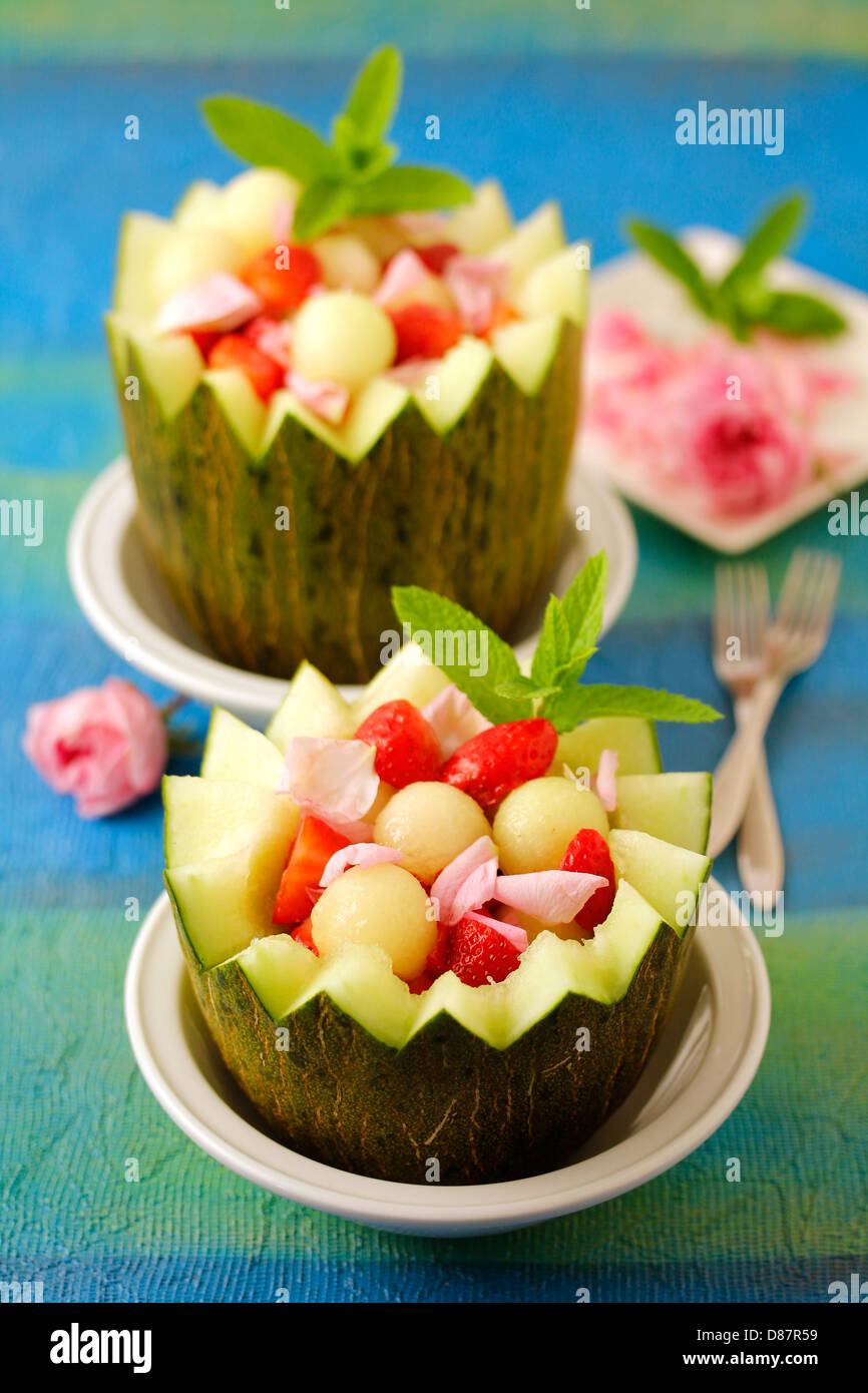 Stuffed melon with roses flavour. Recipe available Stock Photo - Alamy