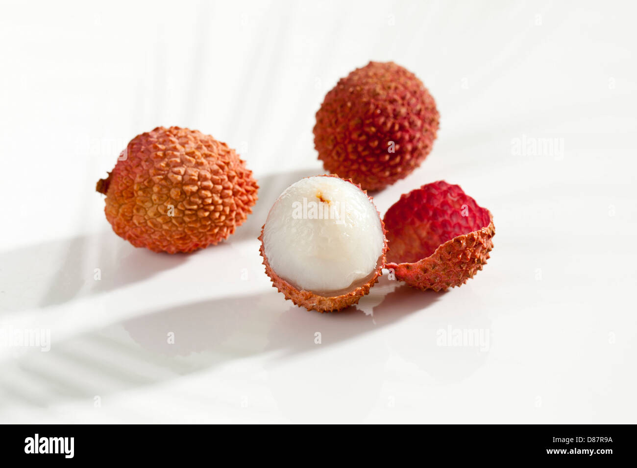 Litchi on white background, close up Stock Photo - Alamy