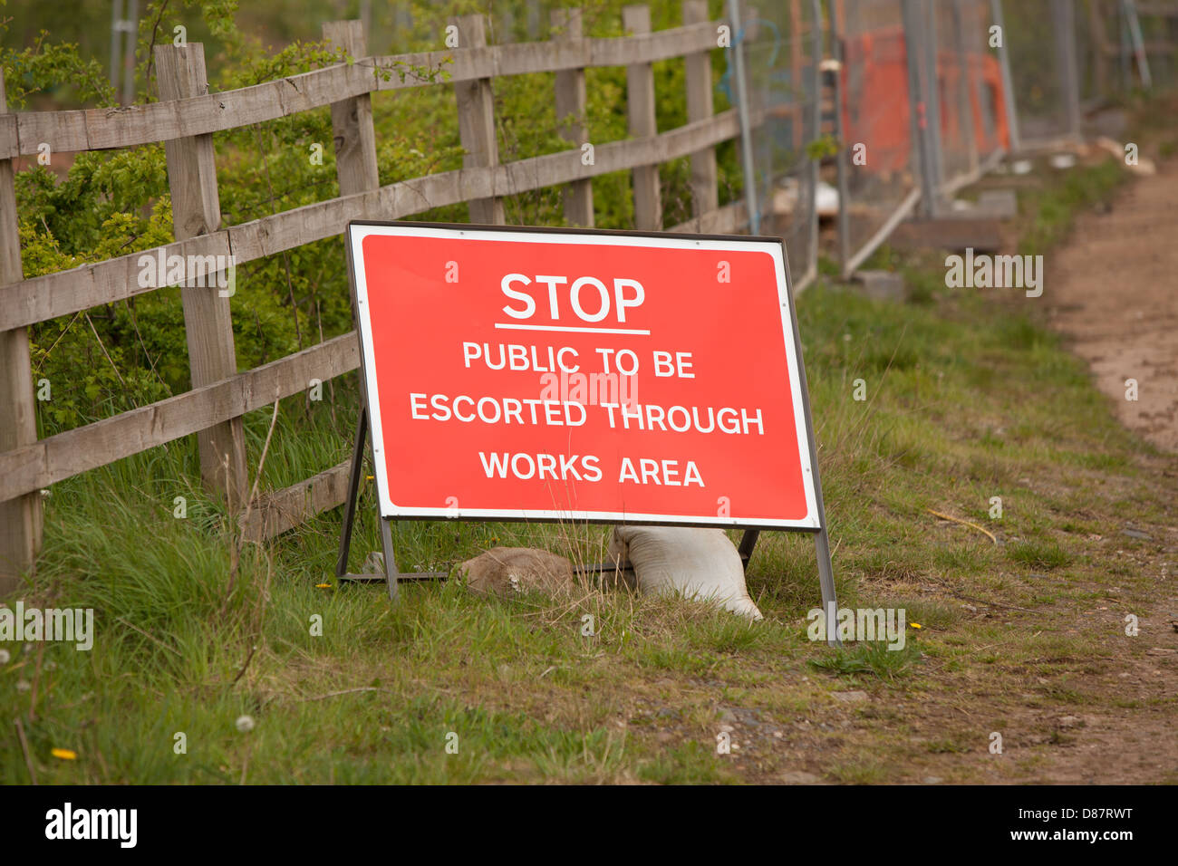 Warning sign near construction site. Stating that "Public to be ...