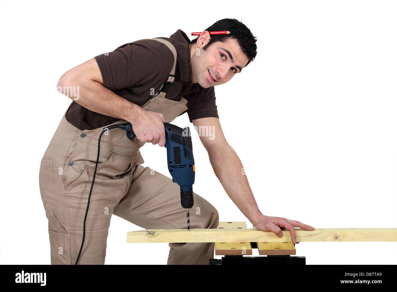 Handyman using a power tool Stock Photo - Alamy