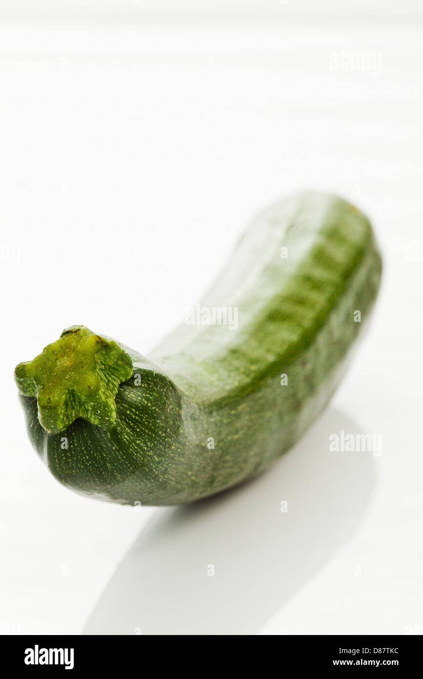 Zucchini on white background, close up Stock Photo - Alamy