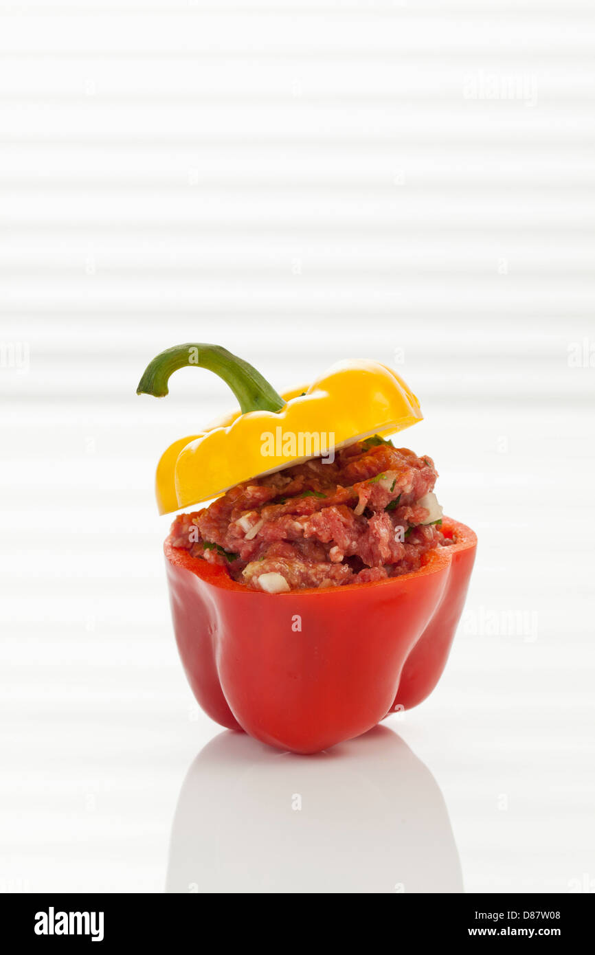 Red bell pepper filled with minced meat, close up Stock Photo - Alamy