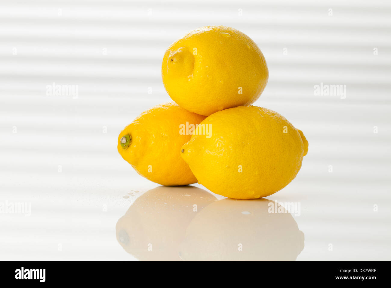 Stack of whole fresh lemons, close up Stock Photo - Alamy