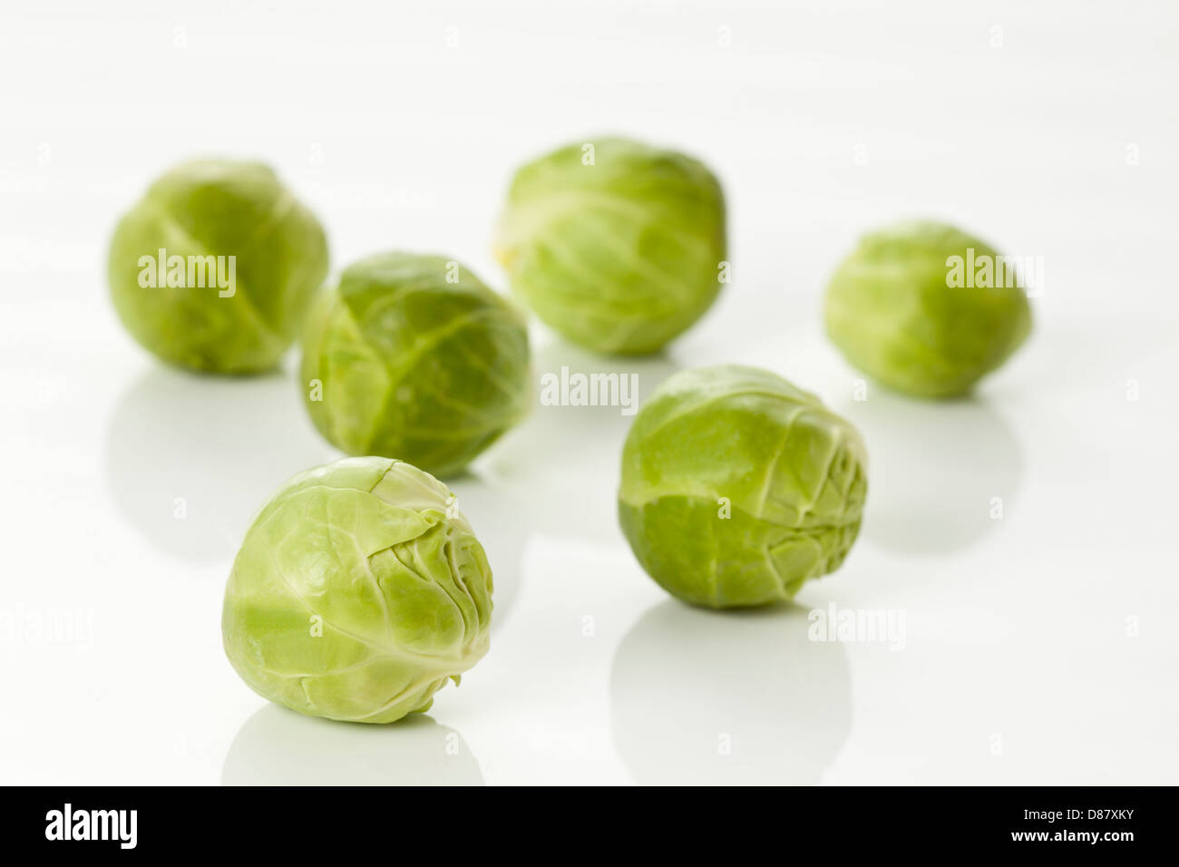 Brussels sprouts on white background, close up Stock Photo - Alamy