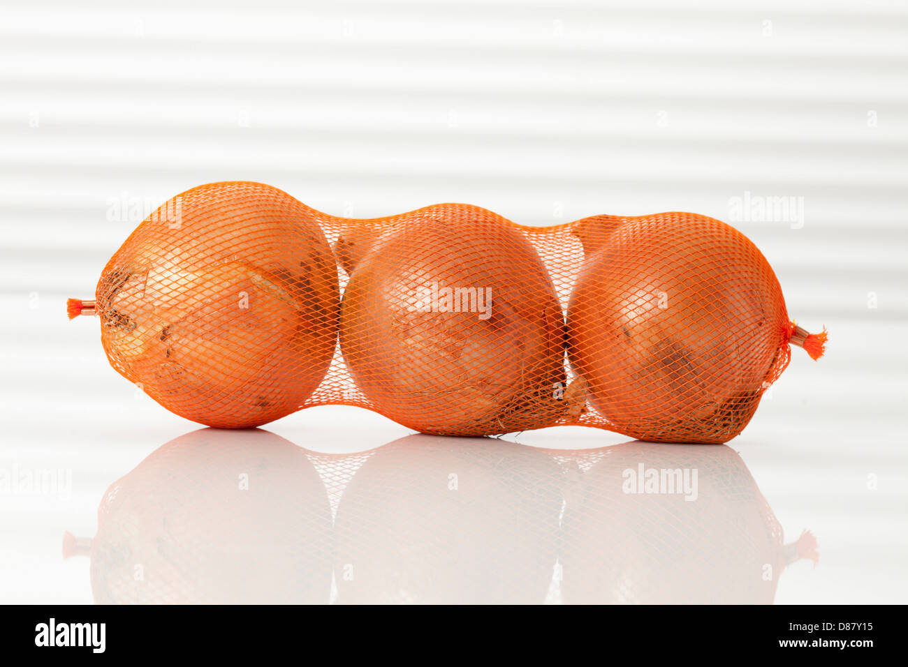 Net with onions hi-res stock photography and images - Alamy