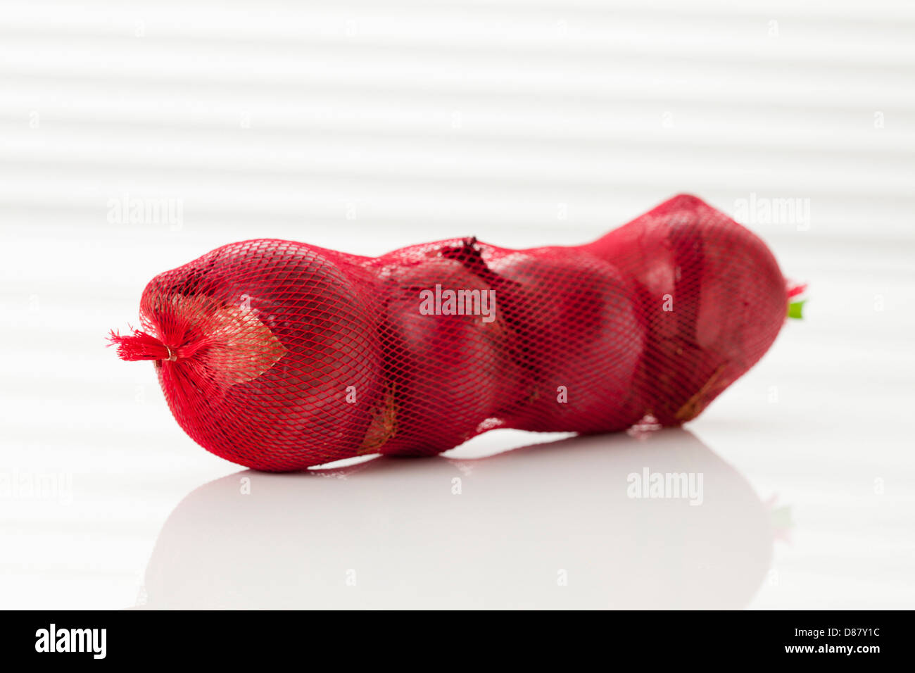 Net with onions hi-res stock photography and images - Alamy