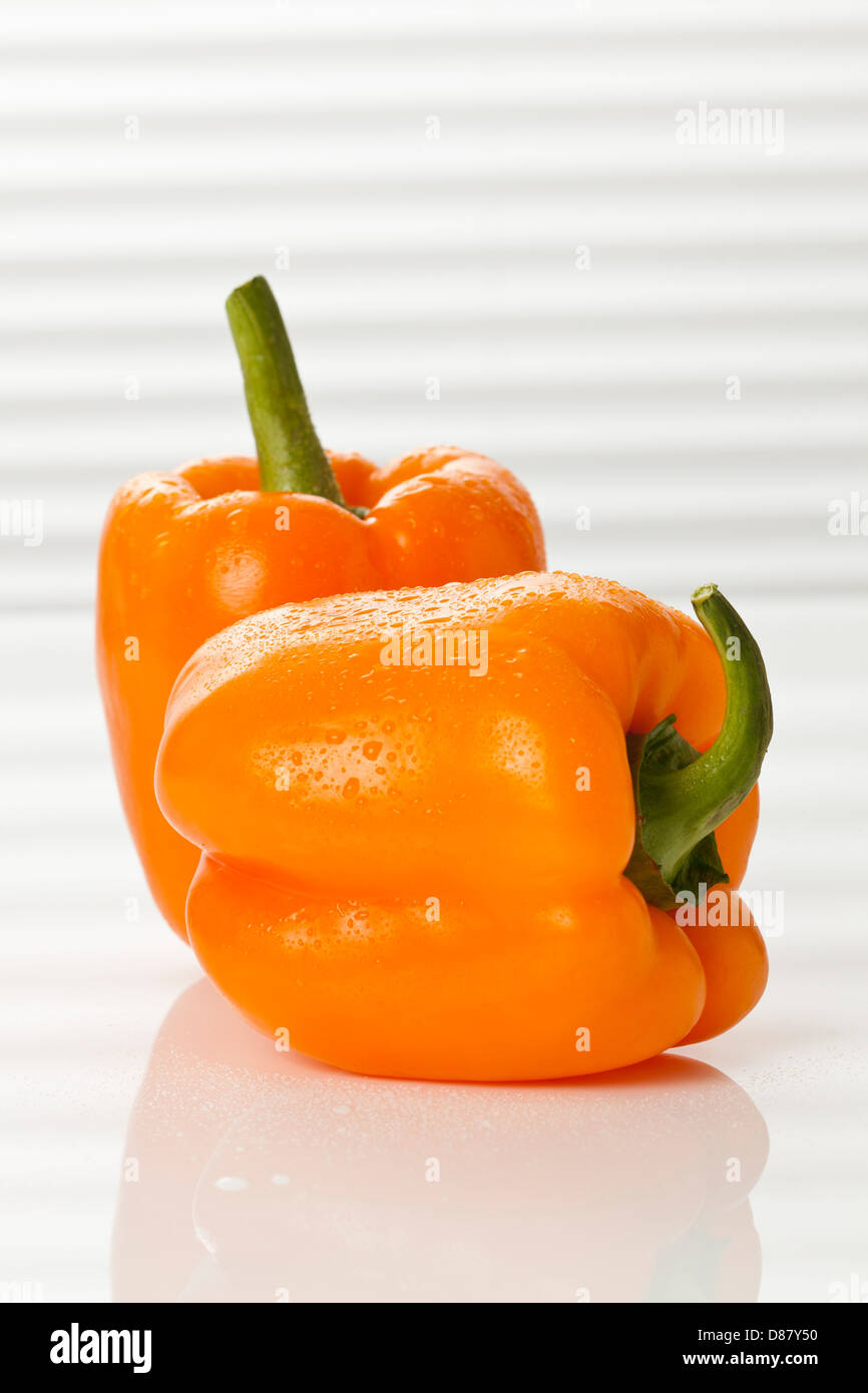 Orange paprikas, close up Stock Photo - Alamy