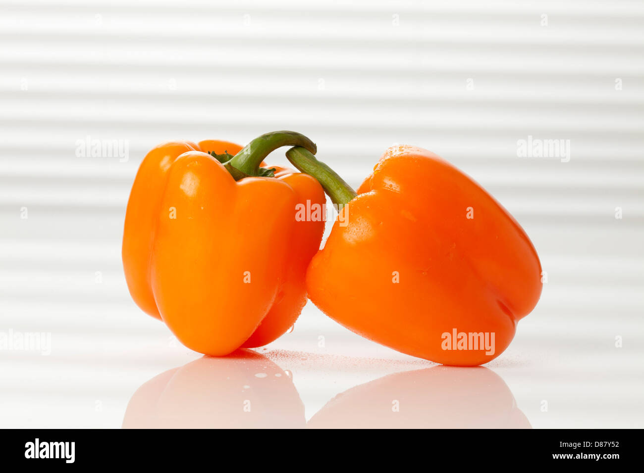 Orange paprikas, close up Stock Photo - Alamy