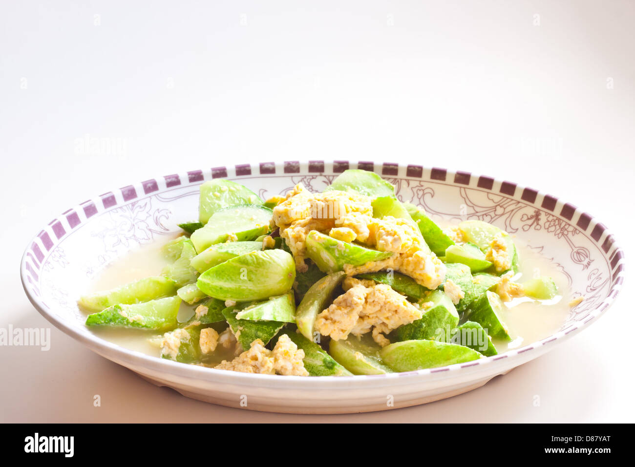 Fried egg with cucumber Stock Photo - Alamy