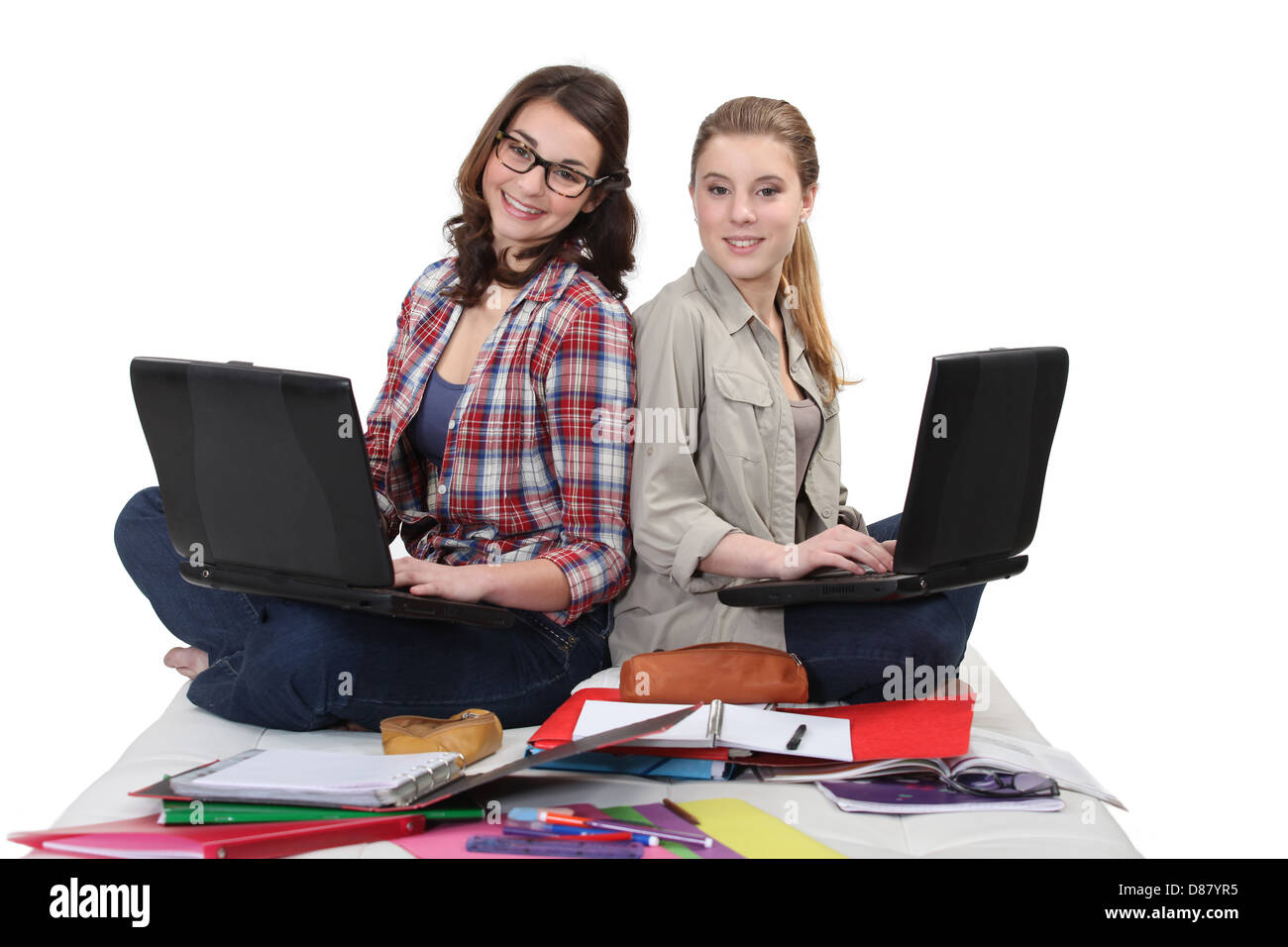 Two female students with laptops Stock Photo - Alamy