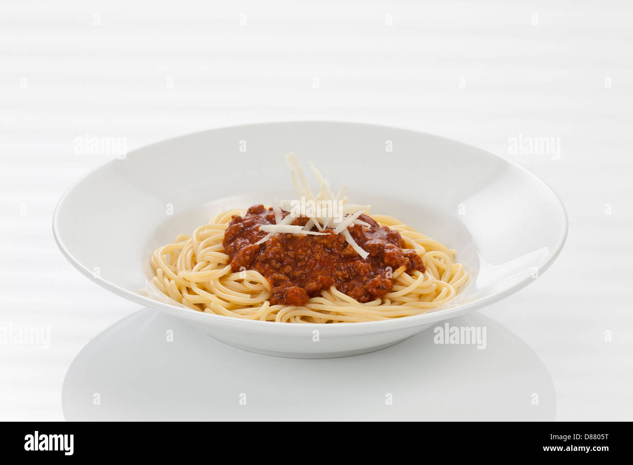 Bowl of spaghetti bolognese with parmesan cheese, close up Stock Photo ...