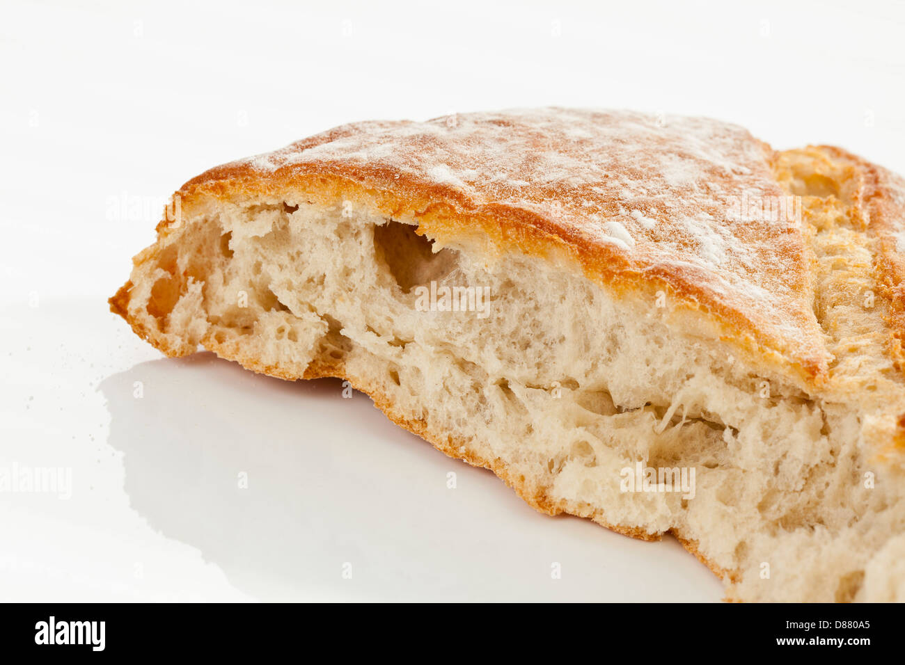 Slice of white bread on white background, close up Stock Photo - Alamy