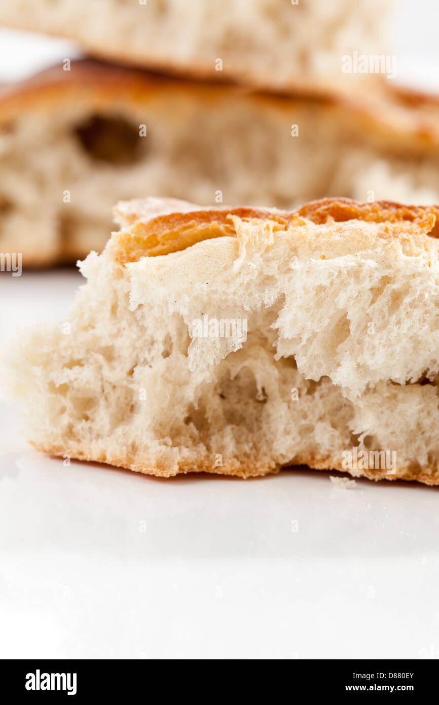 Slice of white bread on white background, close up Stock Photo - Alamy