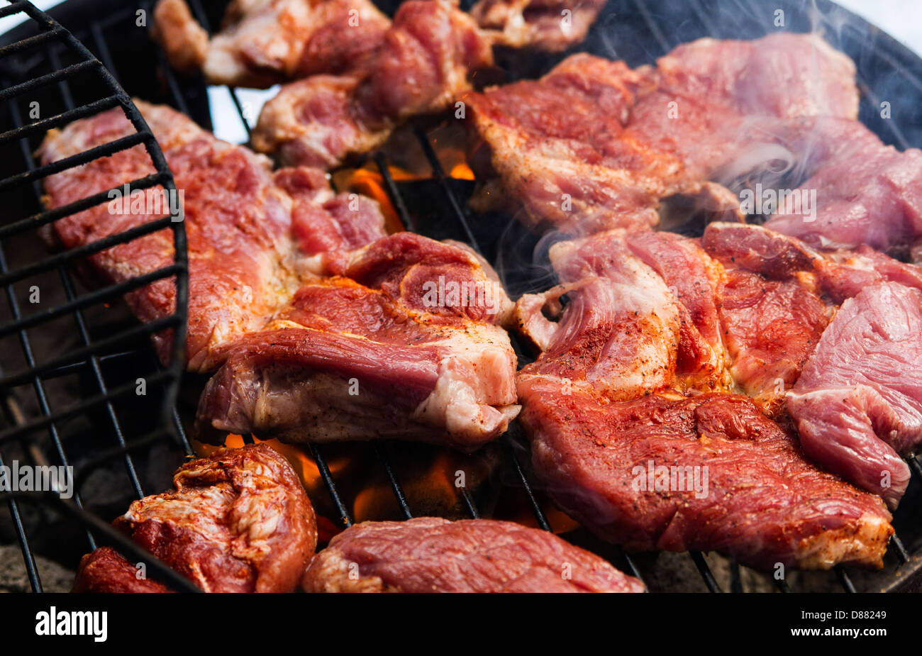 Grill barbecue with delicious pork meat Stock Photo - Alamy