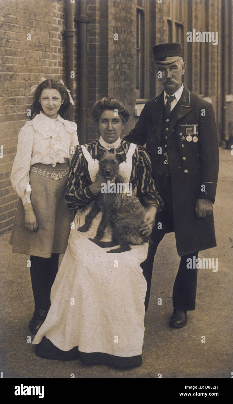 Family group with terrier dog Stock Photo - Alamy