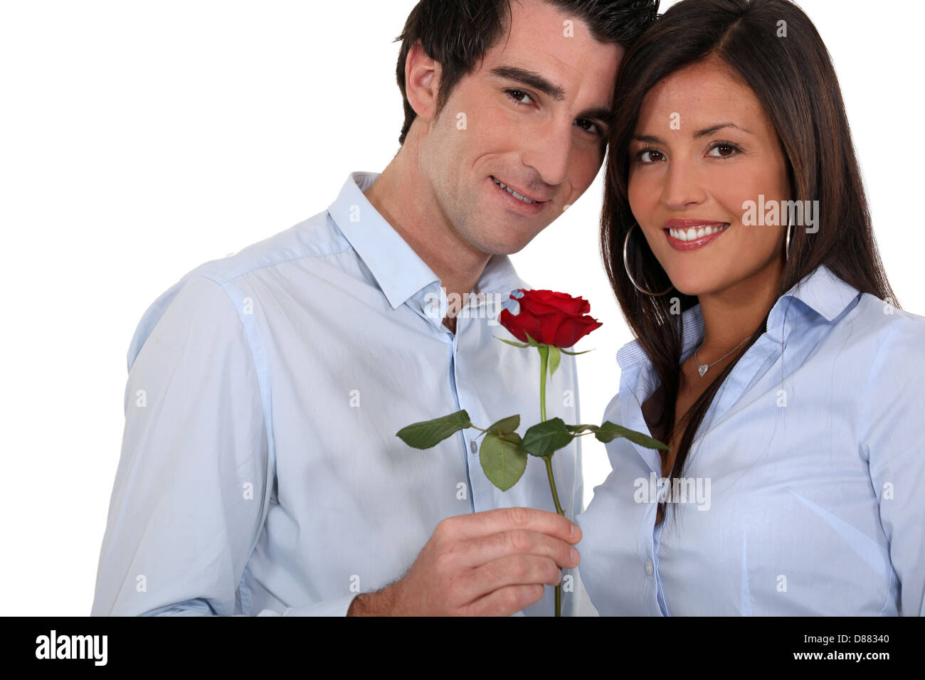 Man giving rose to woman Stock Photo - Alamy