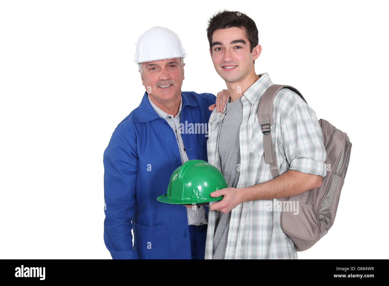 Construction worker and his apprentice Stock Photo - Alamy