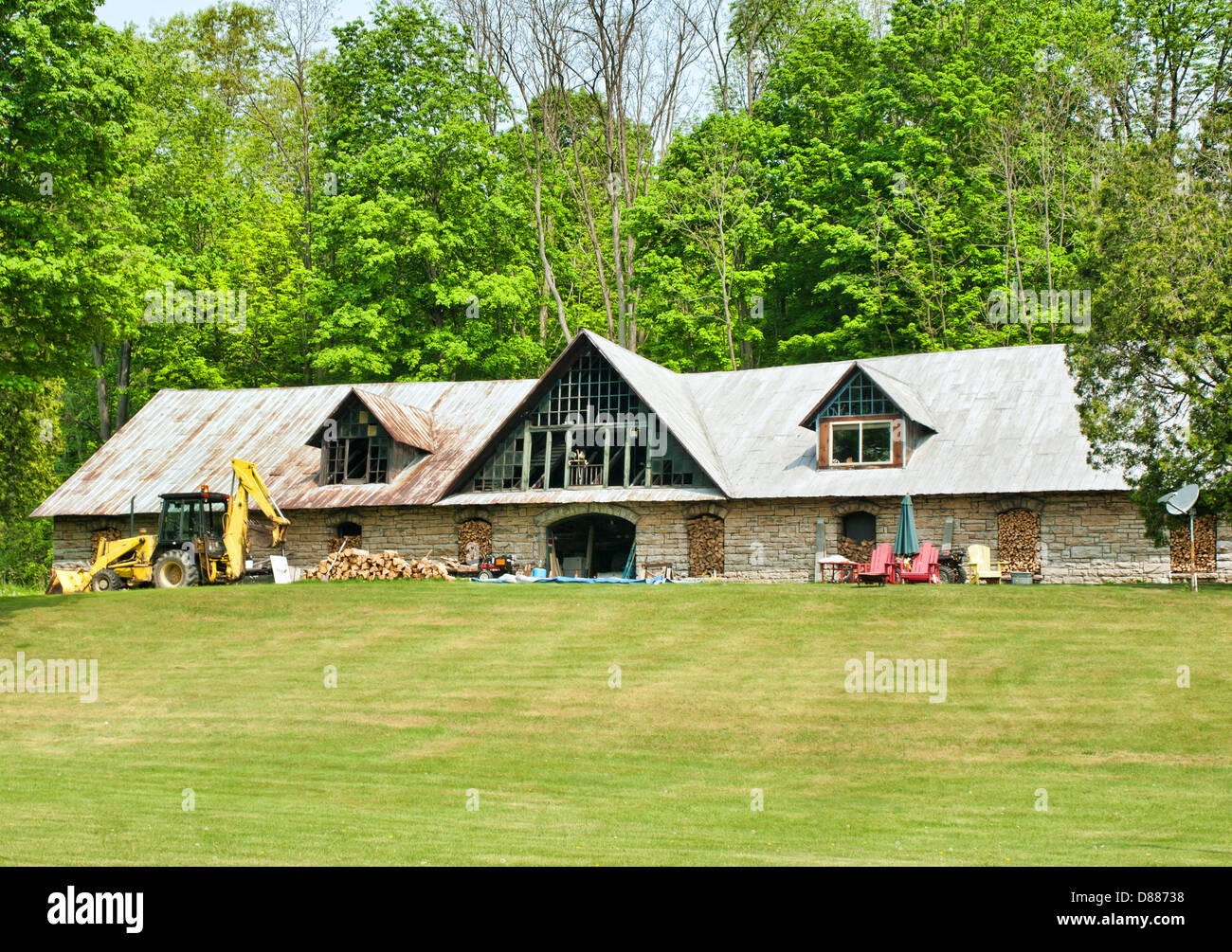 fancy building for storing cut wood Stock Photo - Alamy