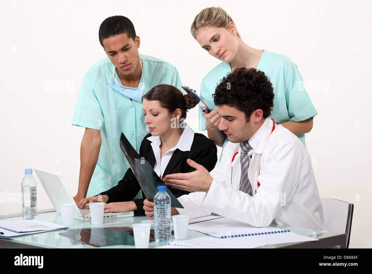 Friendly team colleagues gathered hi-res stock photography and images ...
