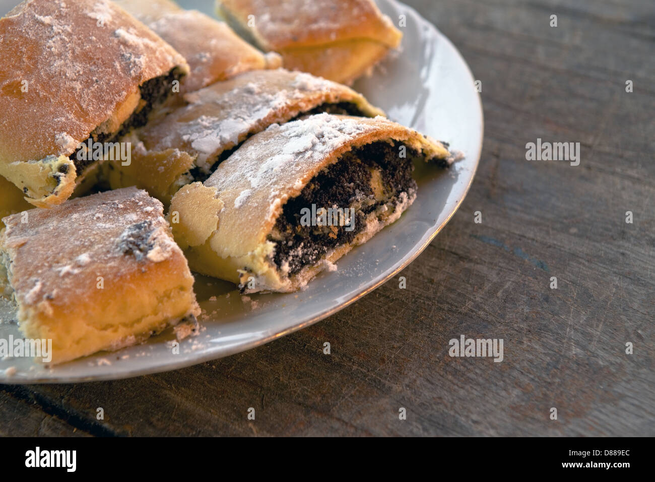 Poppy seed strudel on plate; homemade dessert Stock Photo - Alamy