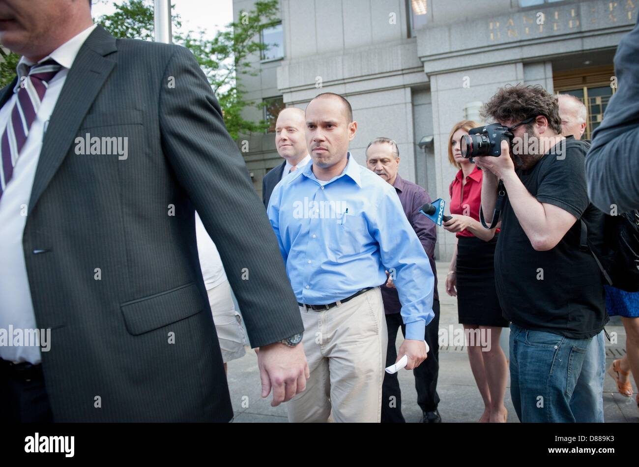New York, USA. 21st May 2013. NYPD officer EDWIN VARGAS exits Manhattan ...
