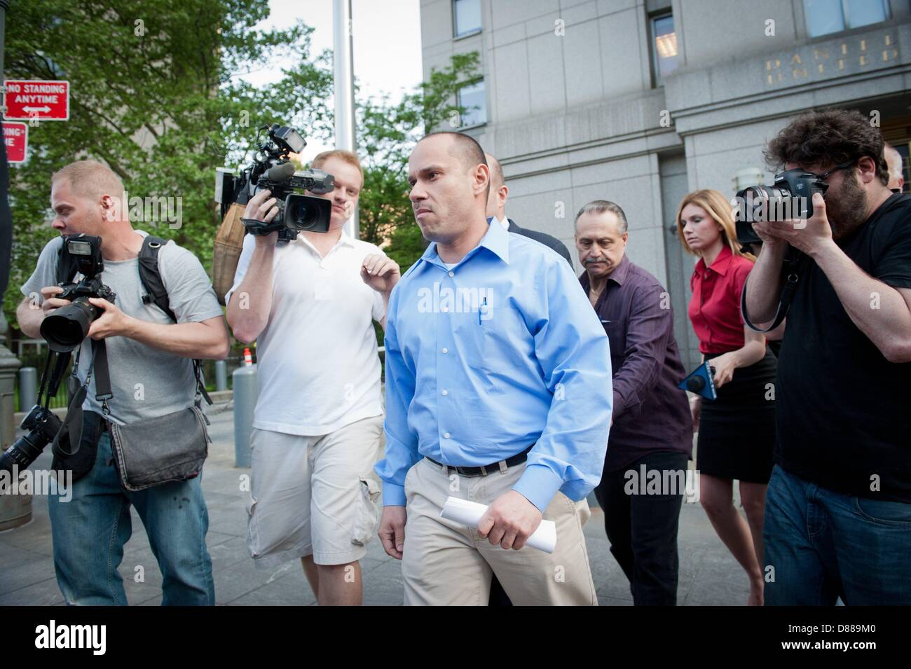 New York, USA. 21st May 2013. NYPD officer EDWIN VARGAS exits Manhattan ...