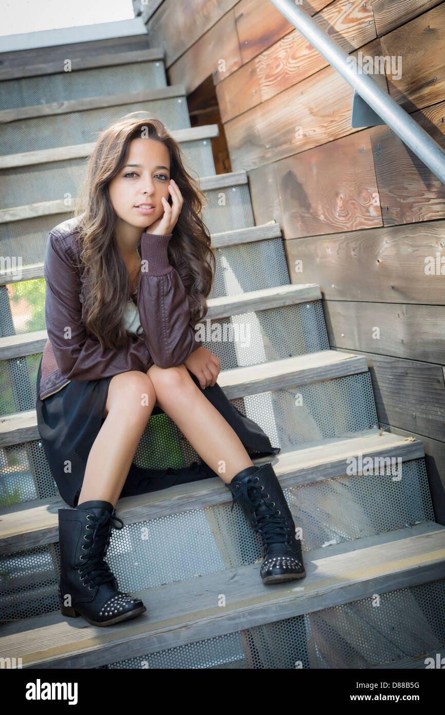 Portrait of a Pretty Mixed Race Young Adult Woman Sitting on a ...