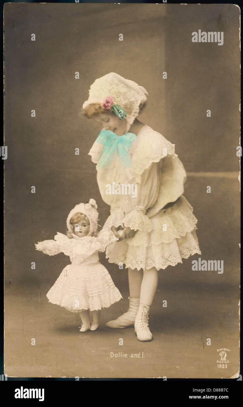 GIRL WALKING WITH DOLL Stock Photo - Alamy