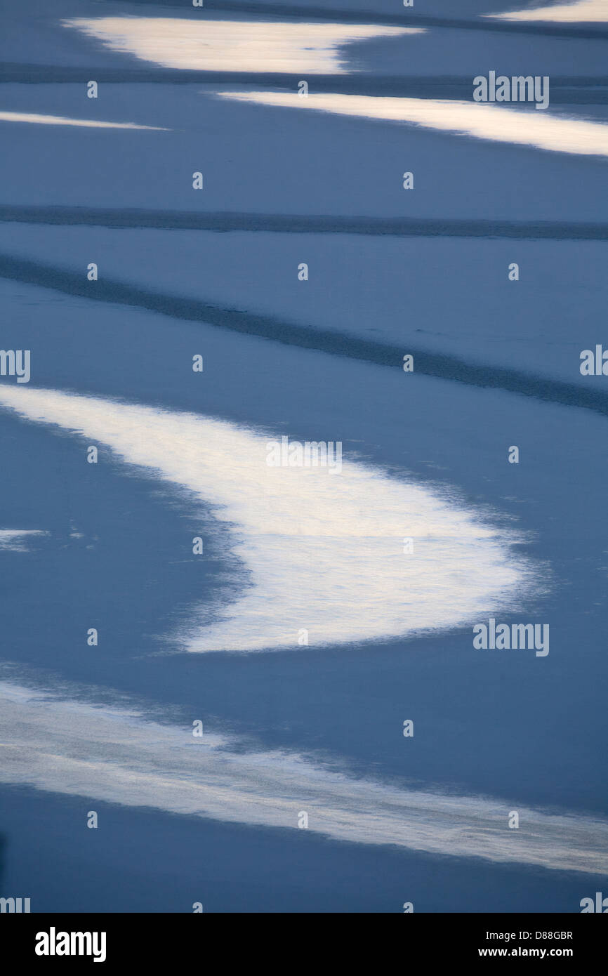 Sun Shadows on Canadian Frozen Lake Alberta Stock Photo - Alamy