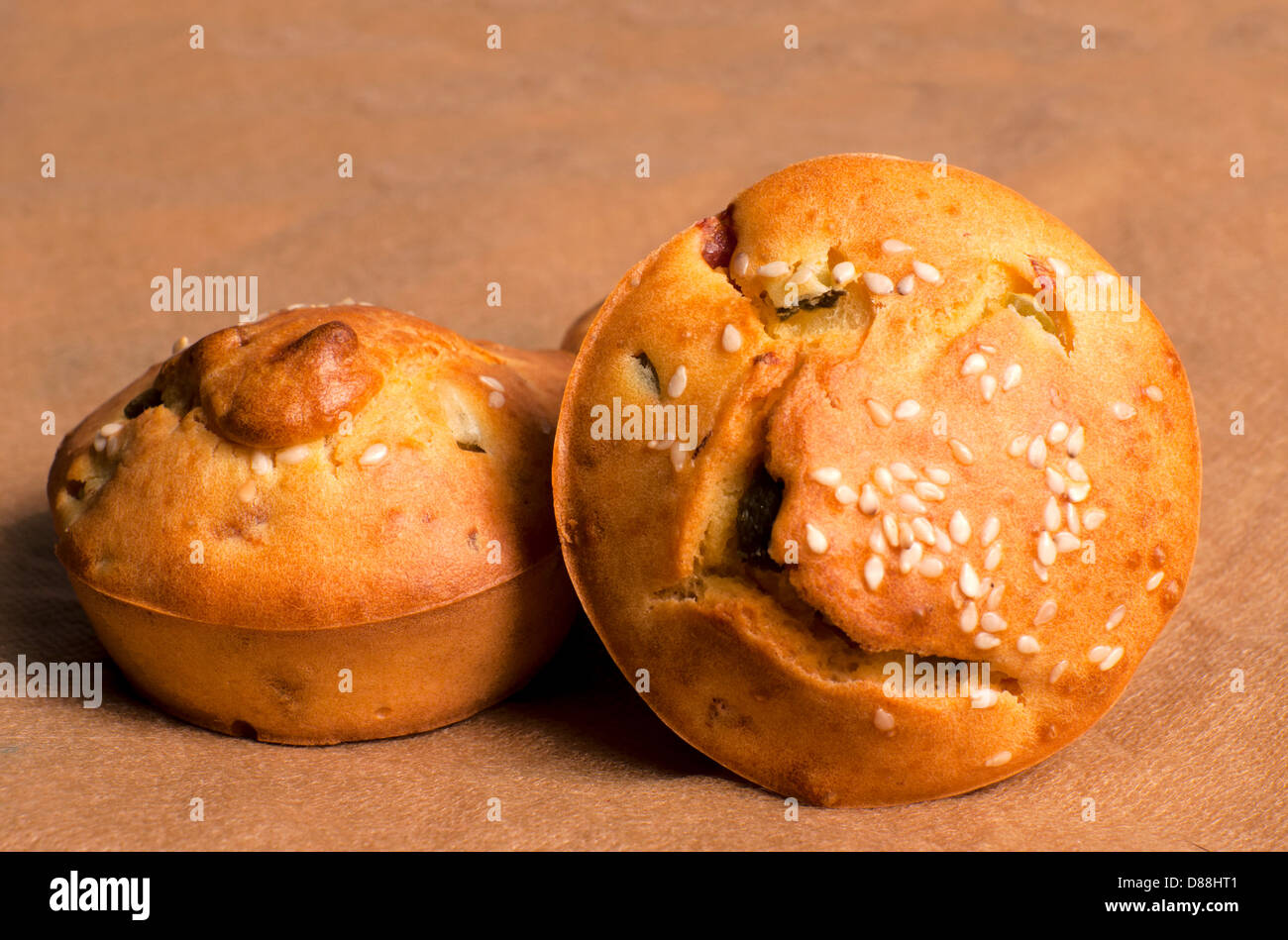 Couple of French meat muffins shoot in low key technique Stock Photo ...