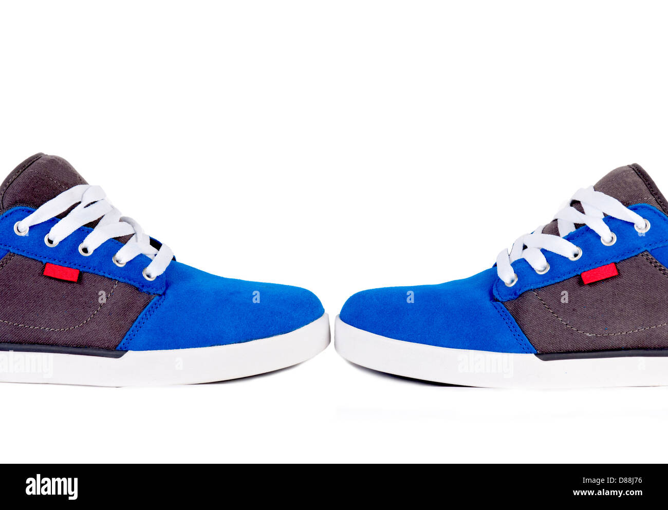 Blue snickers isolated on white background Stock Photo - Alamy