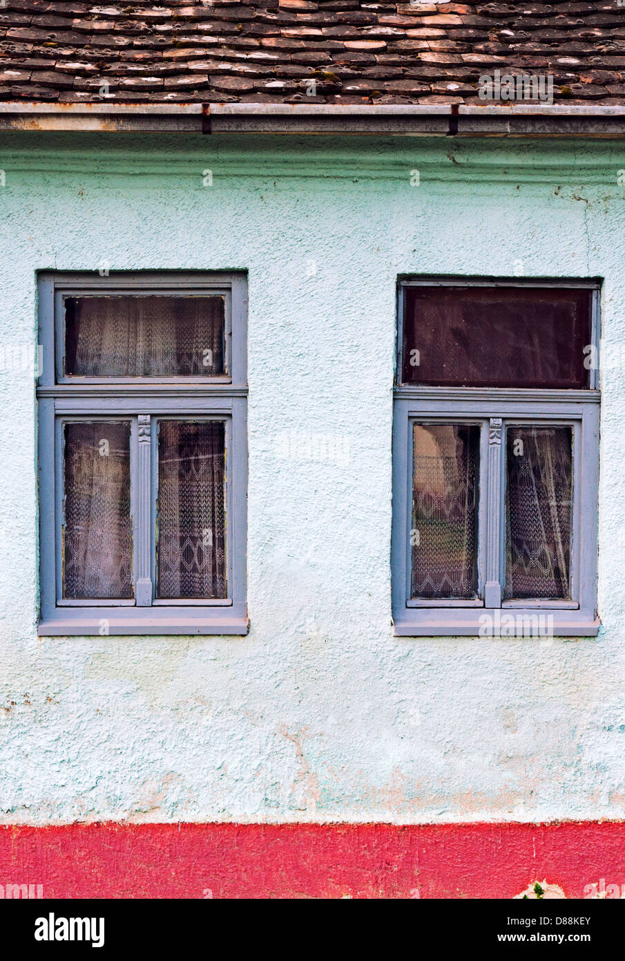 Two windows on the old house Stock Photo - Alamy