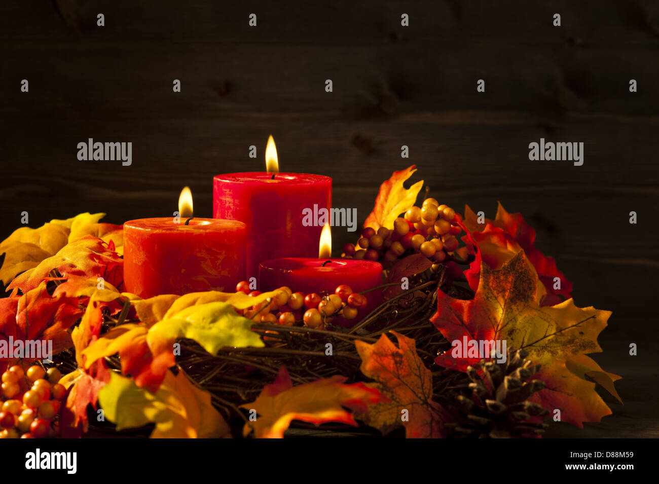 Candles in nice and beautiful colorful autumn leaves Stock Photo - Alamy
