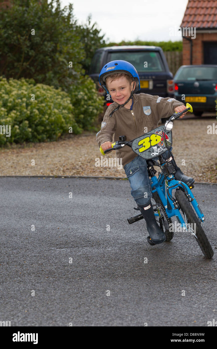 Young boy having fun on his Bicycle Stock Photo - Alamy