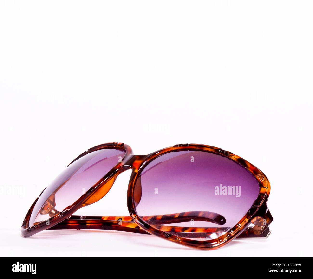 Fancy female sunglasses isolated on white Stock Photo - Alamy