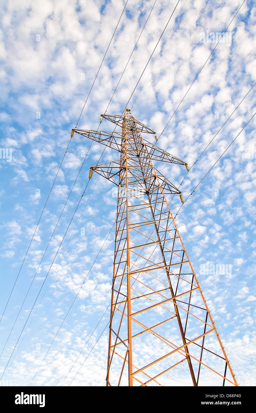 High-voltage power tower over blue sky Stock Photo - Alamy