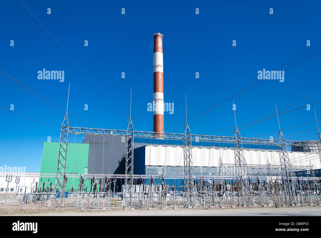 Electric power plant over blue sky Stock Photo - Alamy