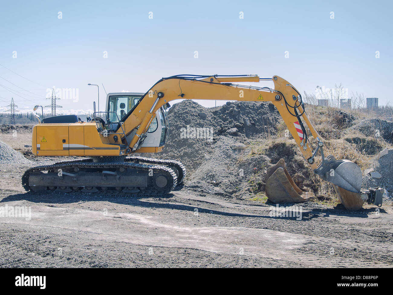 Excavator on construction site Stock Photo - Alamy