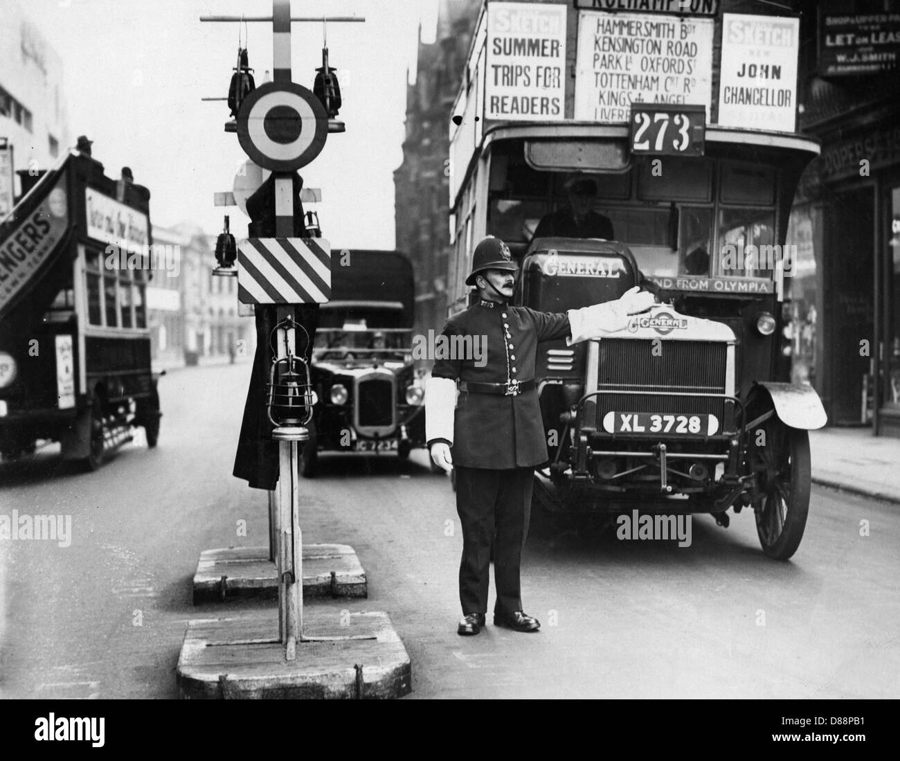 Policeman hand signals hi-res stock photography and images - Alamy