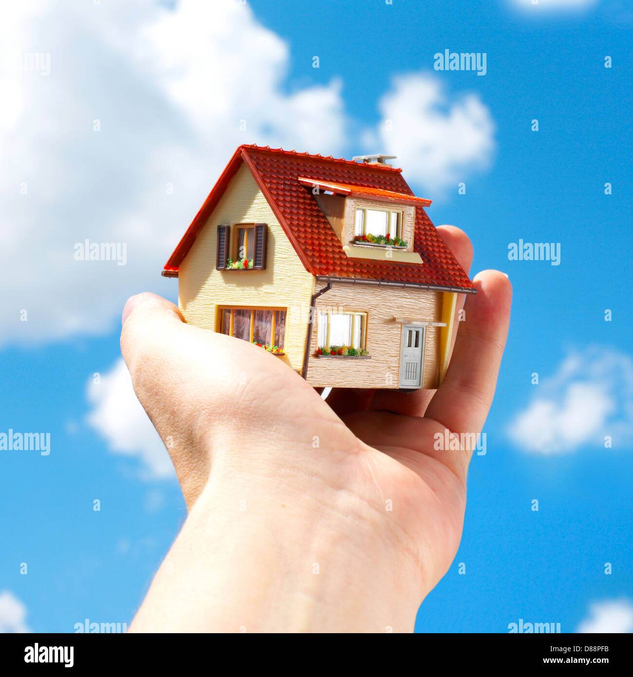 The house in human hands Stock Photo - Alamy