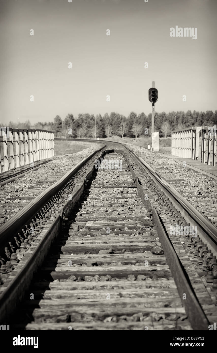 Empty railroad track with semaphore signal. Black and white Stock Photo ...