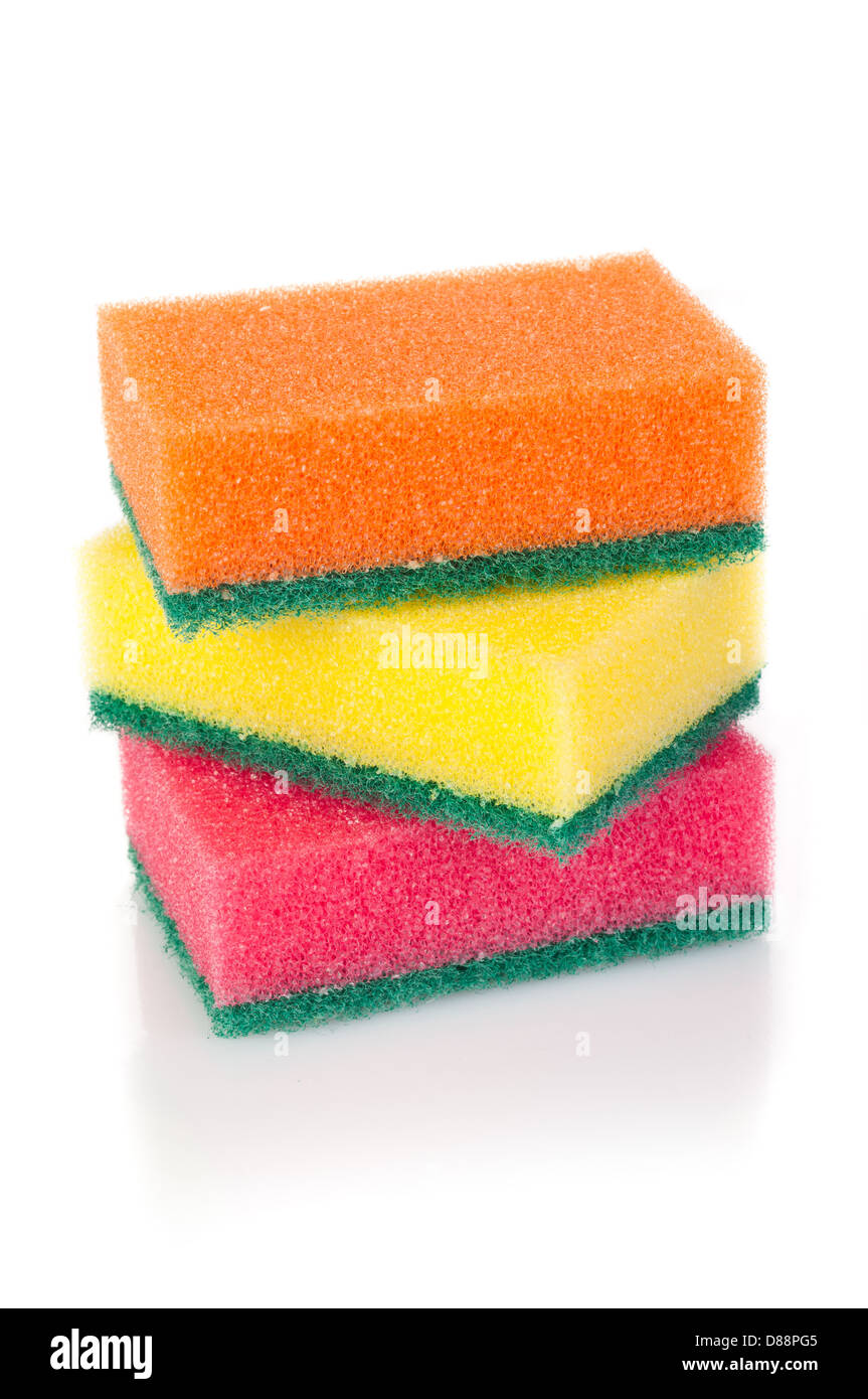 Three colour kitchen sponges on the white Stock Photo - Alamy