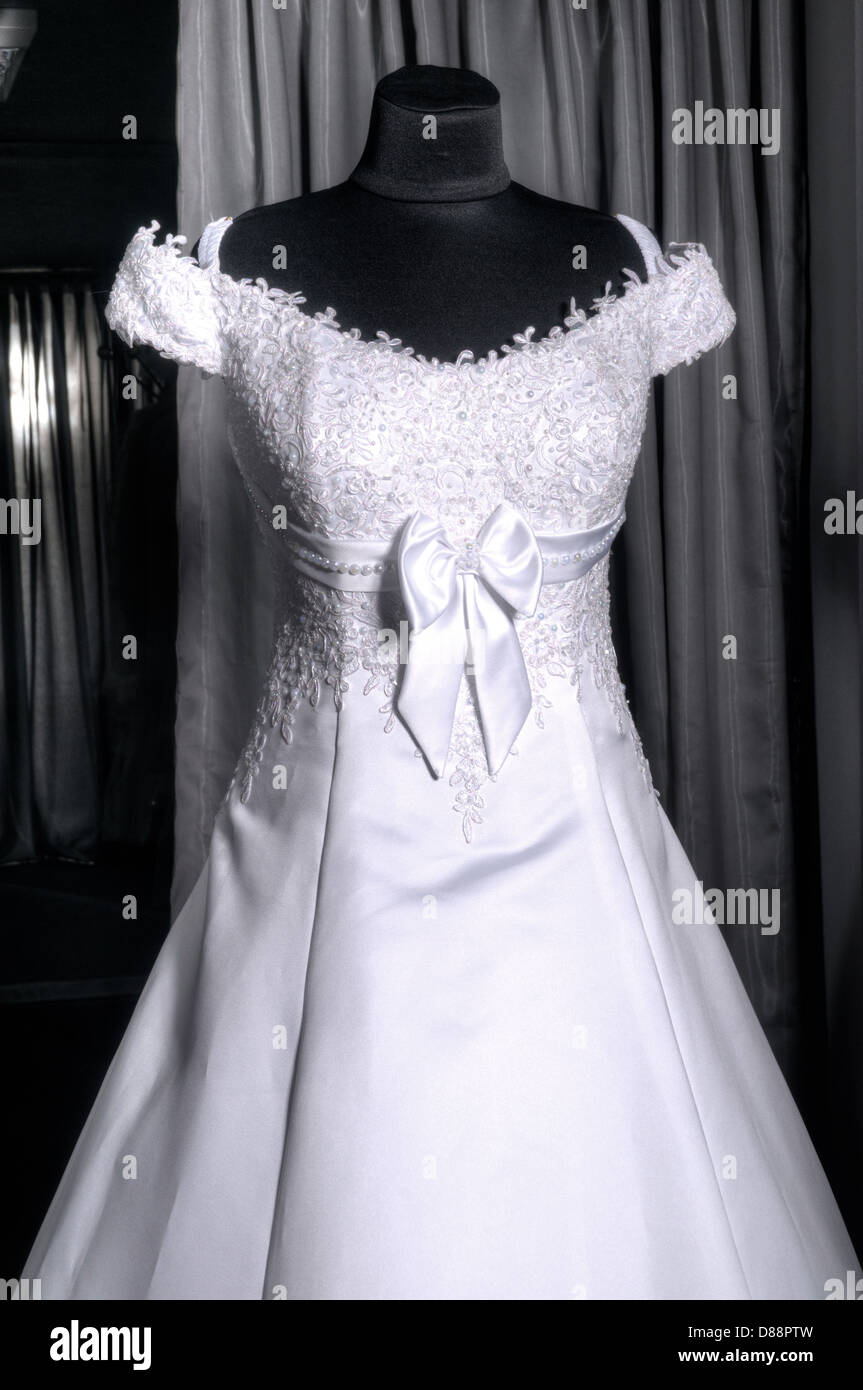 Beautiful female weddings dress on a mannequin Stock Photo - Alamy