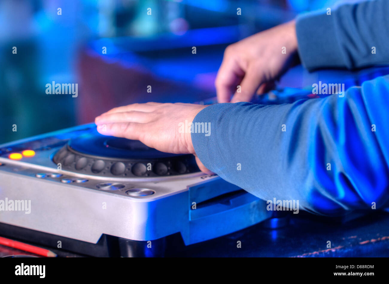 Dj playing the track in the nightclub at a party Stock Photo - Alamy
