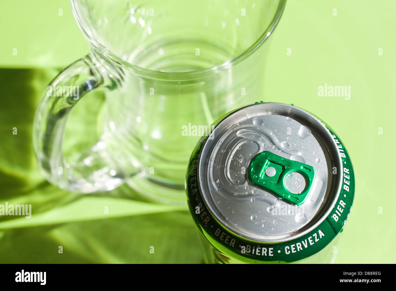 Can of beer with water drop concept Stock Photo - Alamy